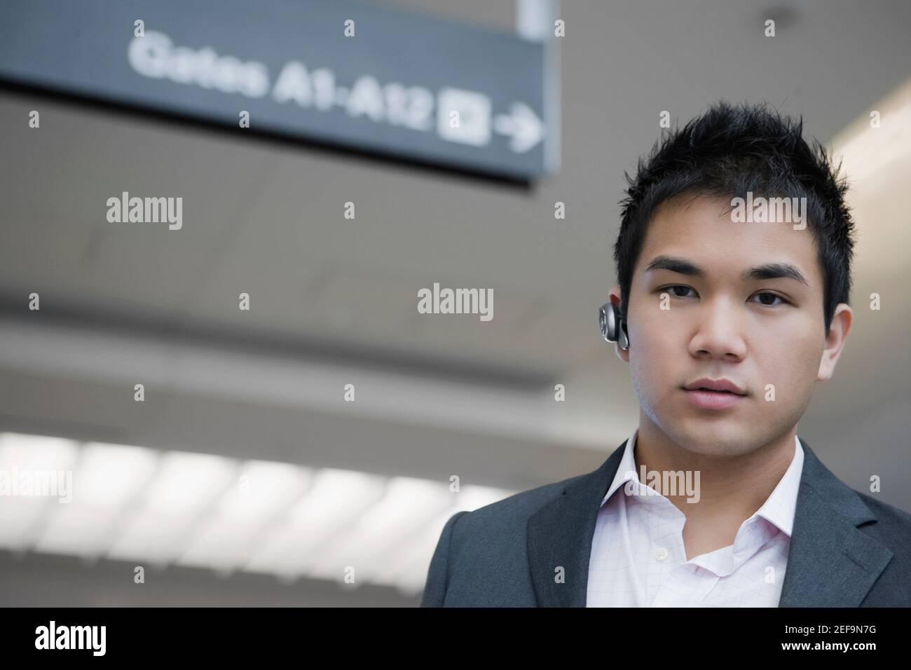 Businessman wearing bluetooth headset hi-res stock photography and ...