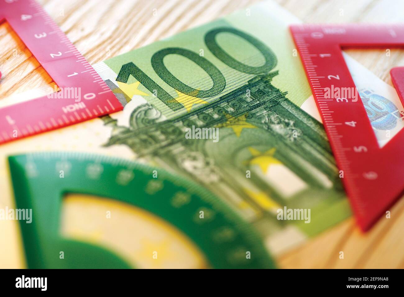 Close-up of geometric instruments on a one hundred Euro banknote Stock ...