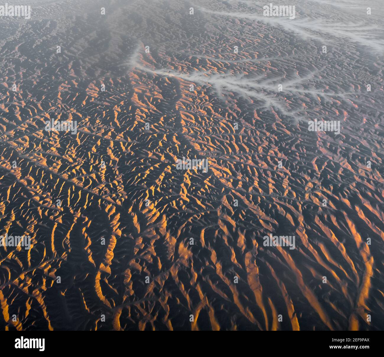 Aerial View from an Airplane. Flying above Beautiful Land at Sunrise ...