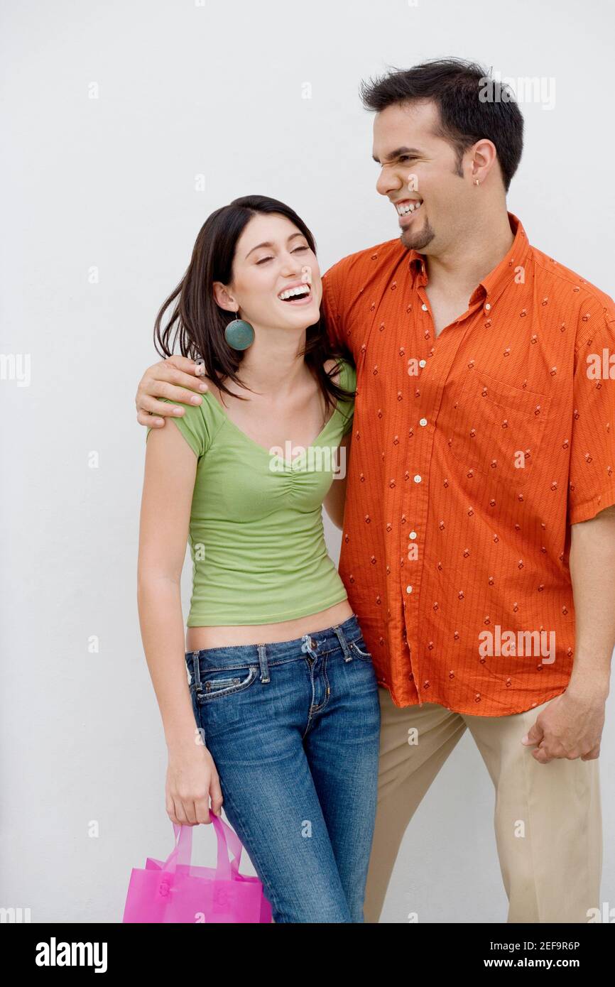 Close-up of a mid adult man with his arm around a teenage girl Stock ...