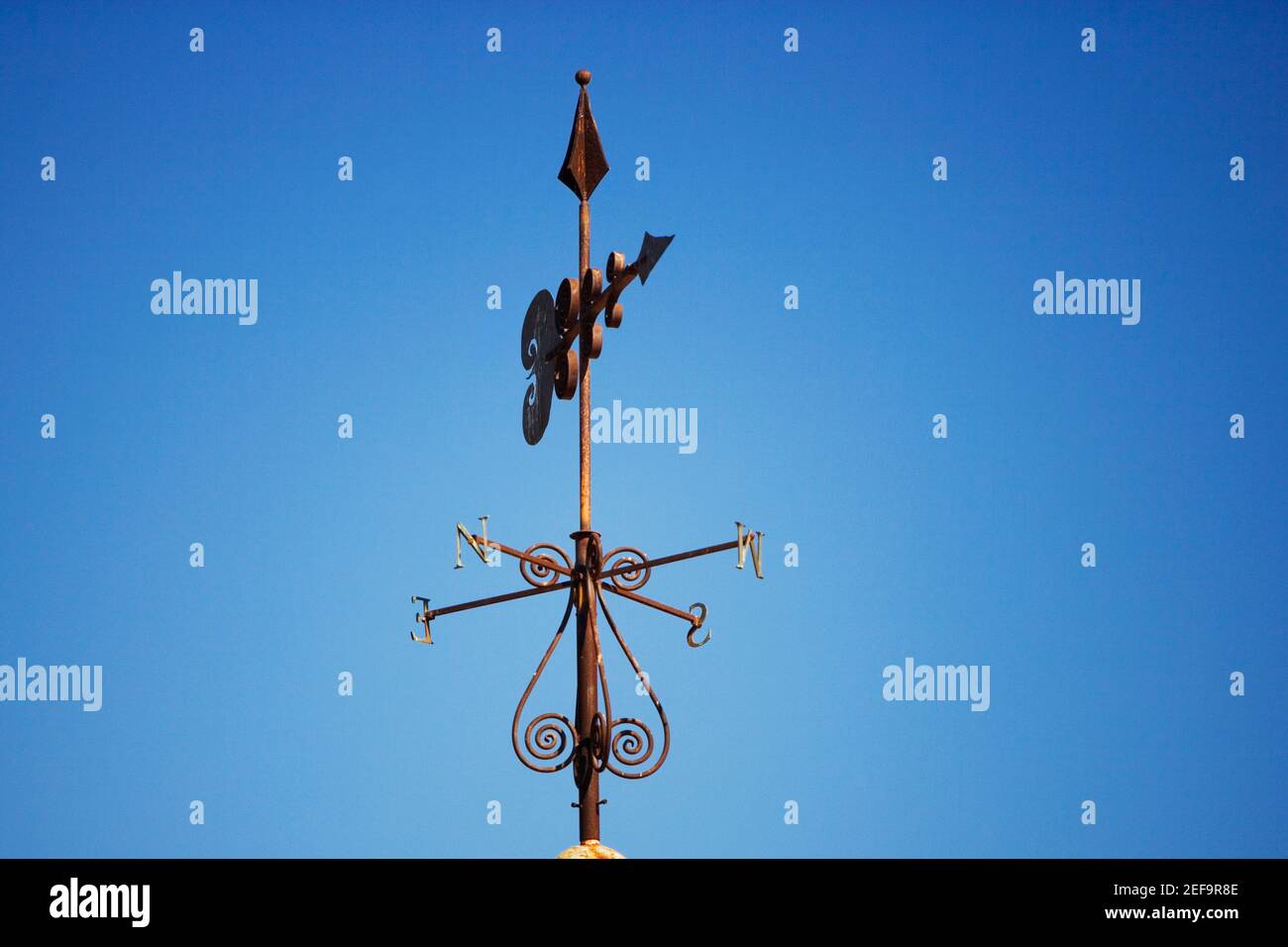 Weather vane on rooftop hi-res stock photography and images - Alamy