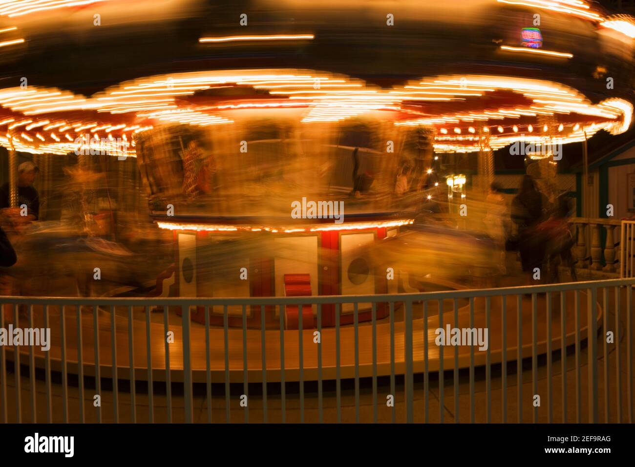 Close-up of a carousel at night Stock Photo - Alamy