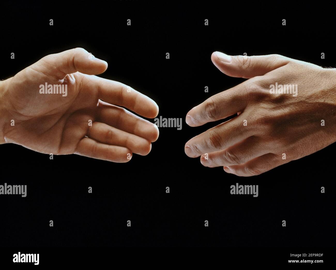 Black hands reaching up hi-res stock photography and images - Alamy