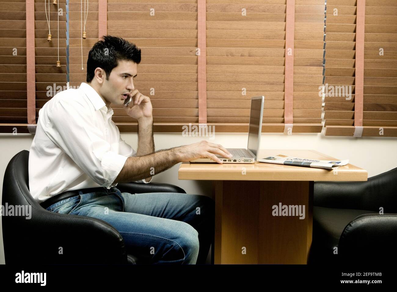 Sitting down profile man hi-res stock photography and images - Alamy
