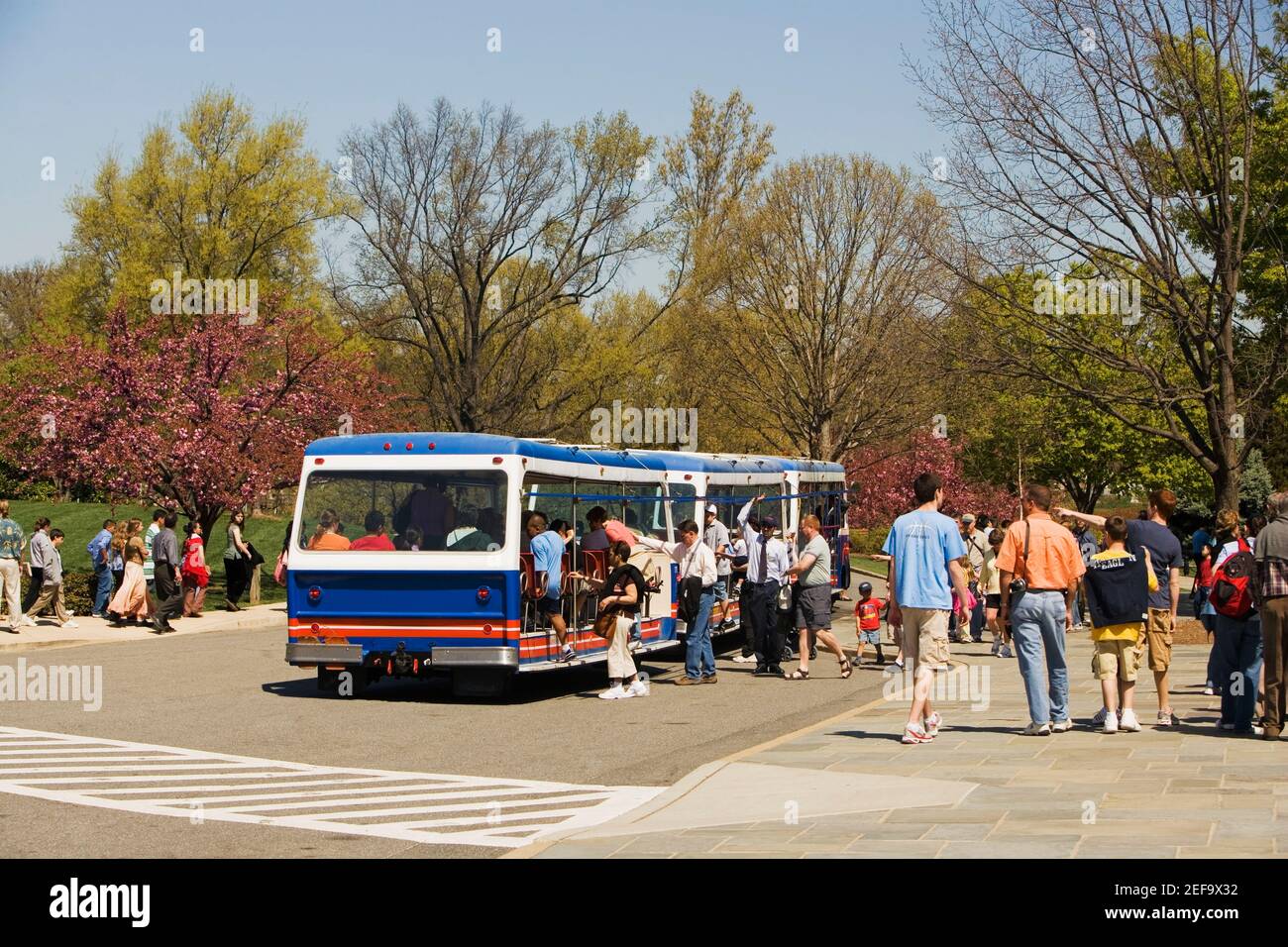 Commuters boarding a bus on the road Stock Photo - Alamy