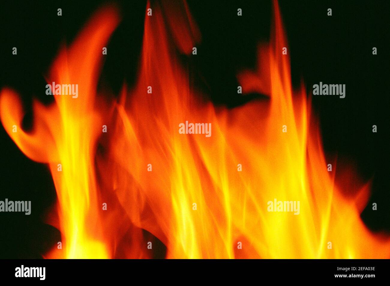 Close-up of the flames of a log fire Stock Photo - Alamy