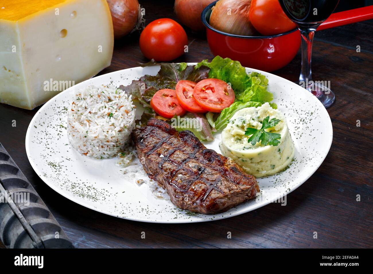 Rice with potatoes and meat Stock Photo - Alamy