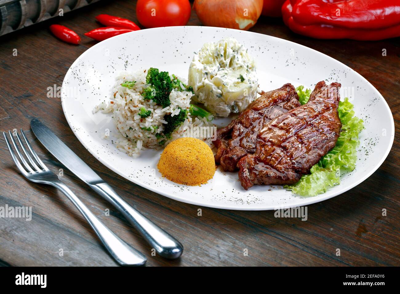 Rice with potatoes and meat Stock Photo - Alamy