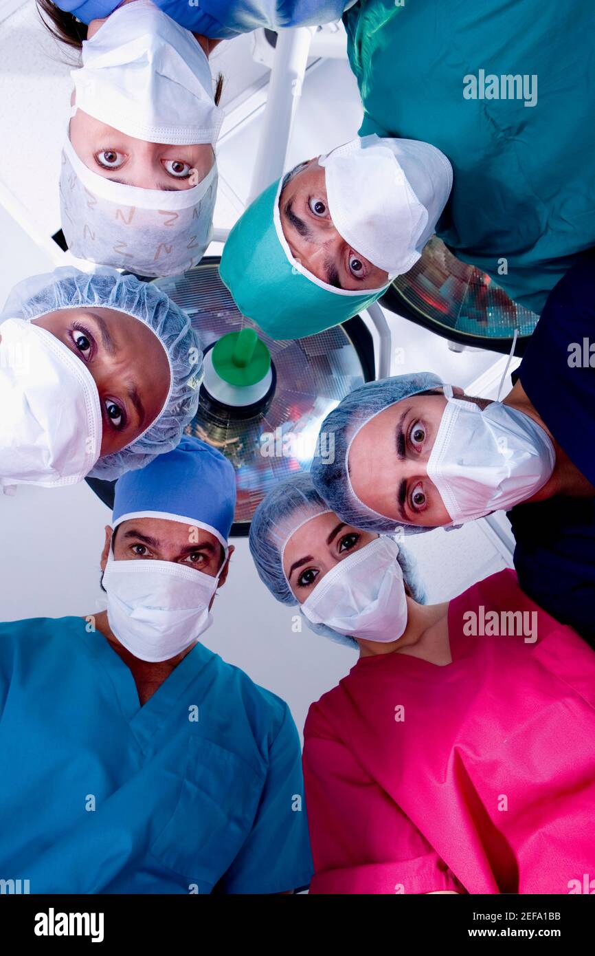 Low angle view of surgeons in an operating room Stock Photo - Alamy