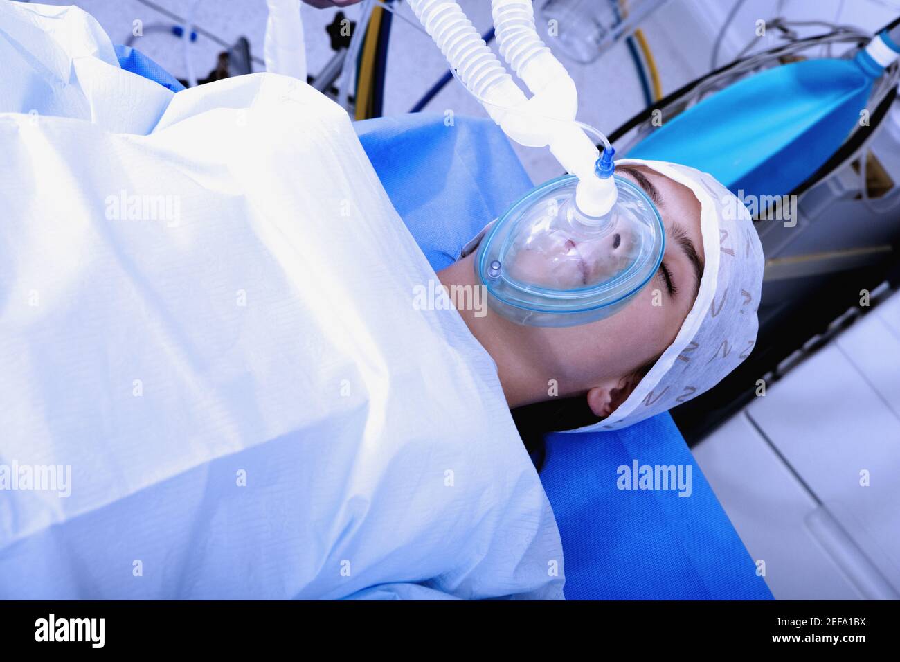 Patient lying on an operating table hi-res stock photography and images ...