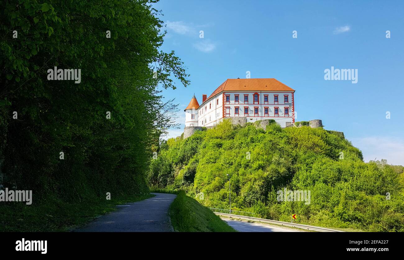 Amazing medieval castle in spring. Top of hill, sunny day, landmark ...