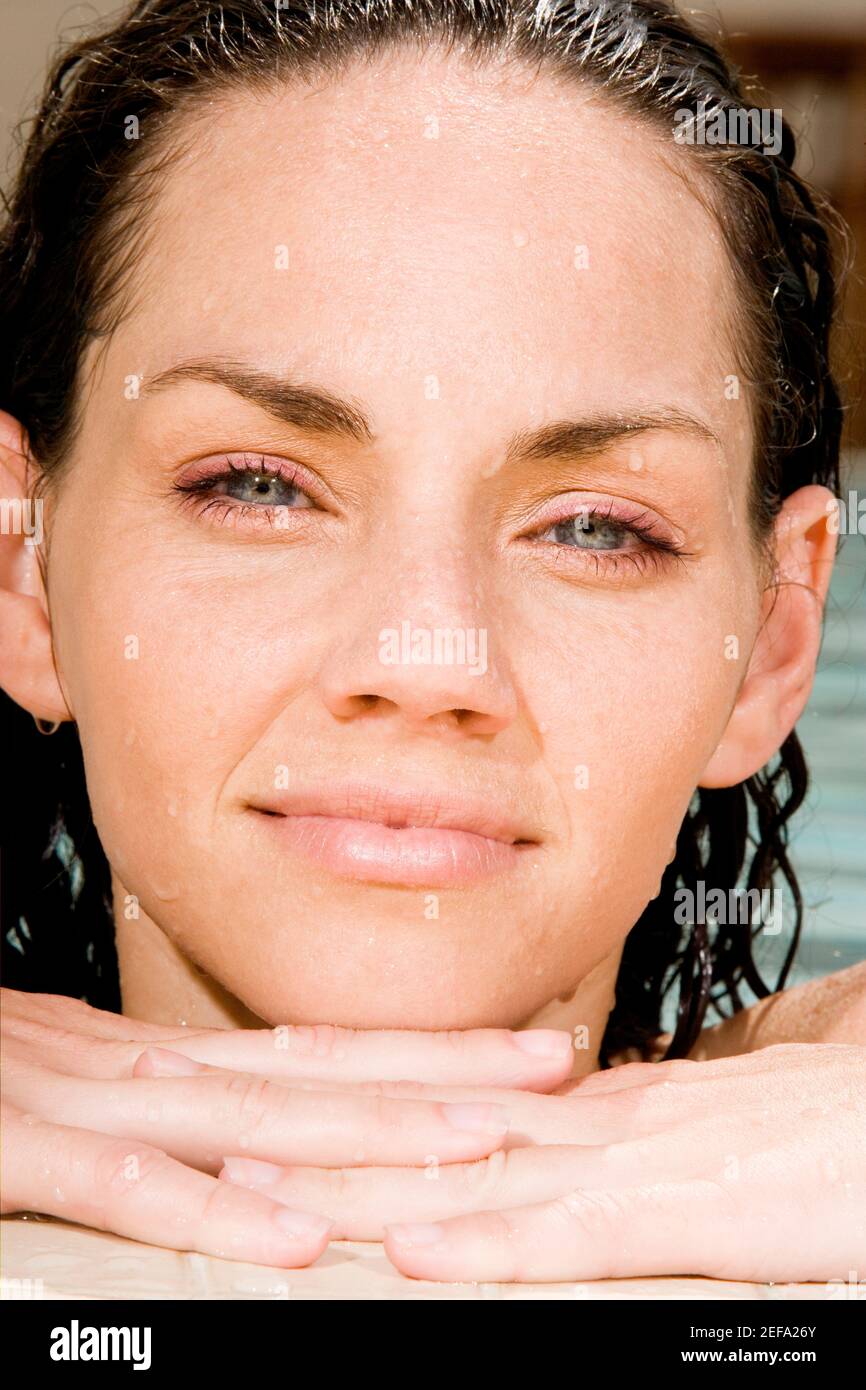 Woman edge pool water looking hi-res stock photography and images - Alamy