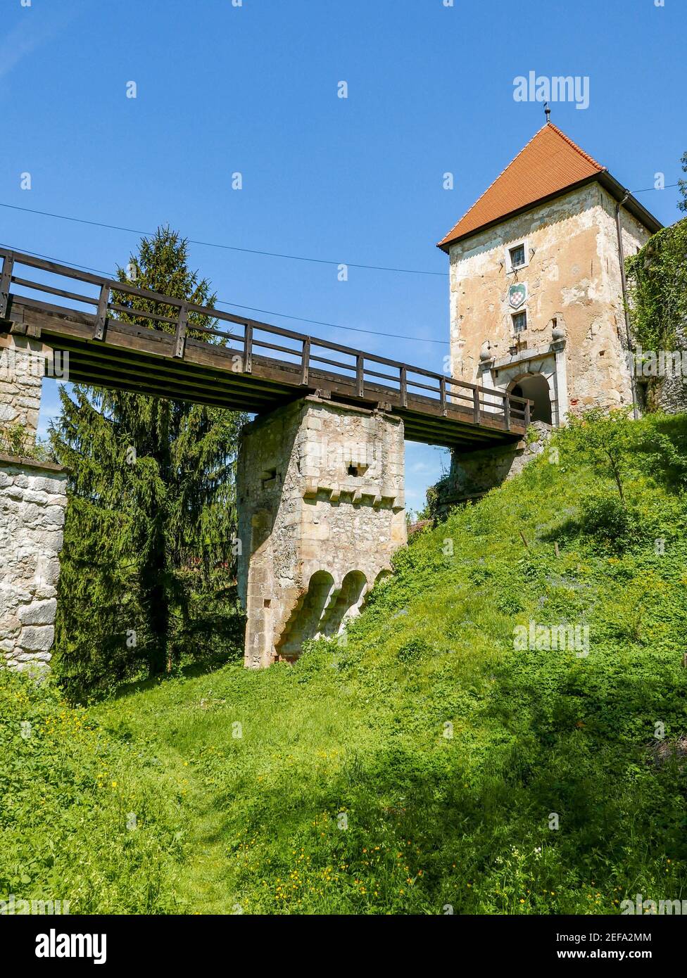 Amazing medieval castle in spring. Top of hill, sunny day, landmark ...