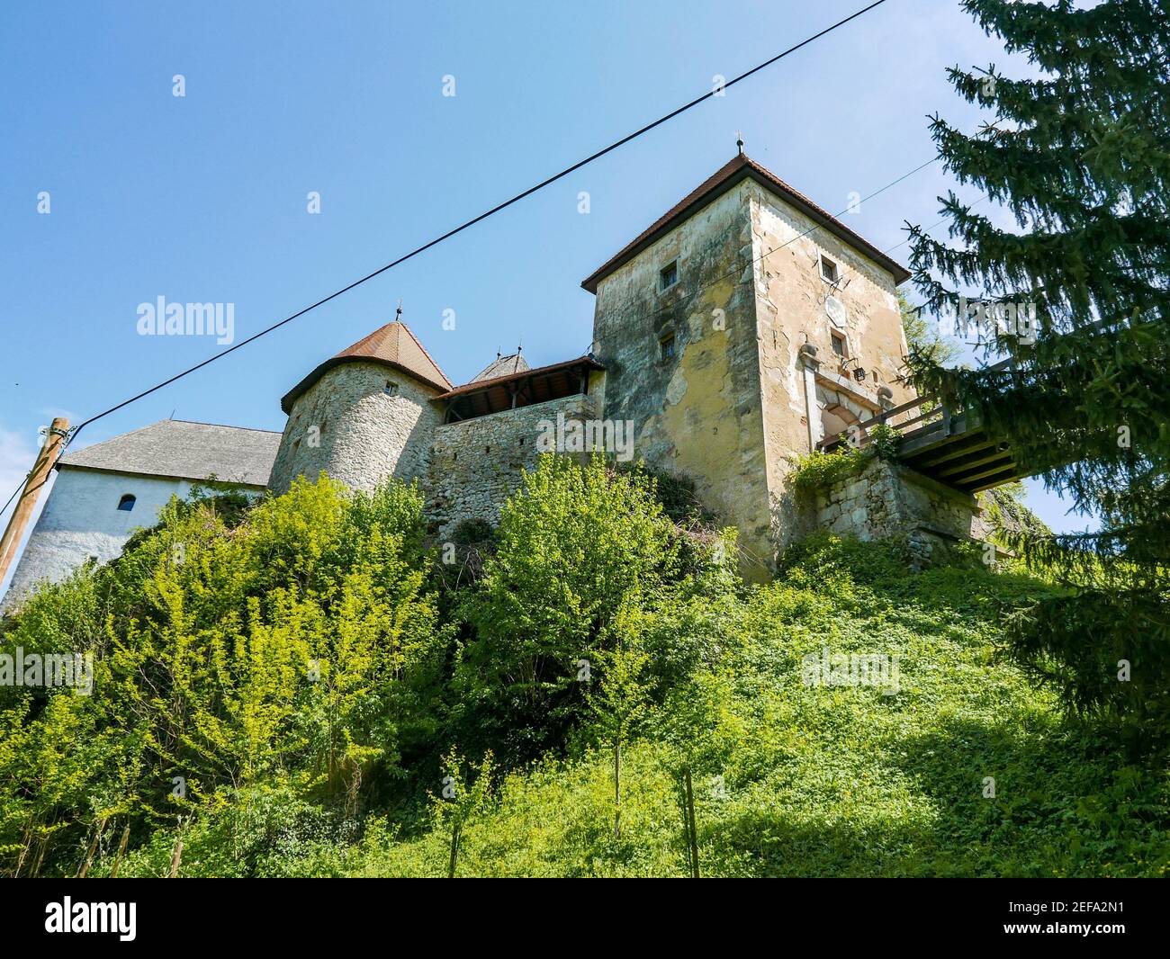 Amazing medieval castle in spring. Top of hill, sunny day, landmark ...