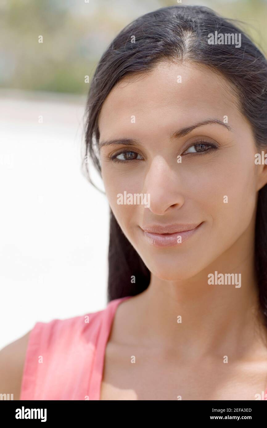 Woman smirking hi-res stock photography and images - Alamy