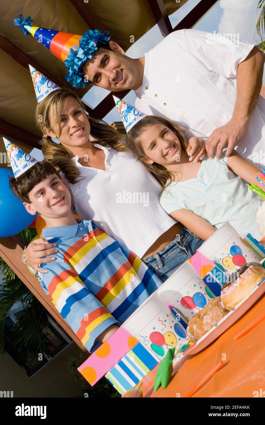 Portrait of a family celebrating a birthday party Stock Photo - Alamy