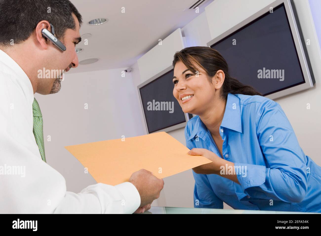 Giving a file hi-res stock photography and images - Alamy