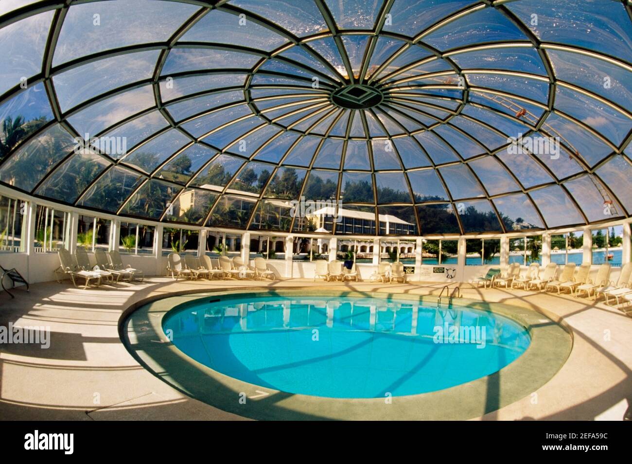 Modern look of a circular swimming pool in Somesta hotel, Bermuda Stock ...