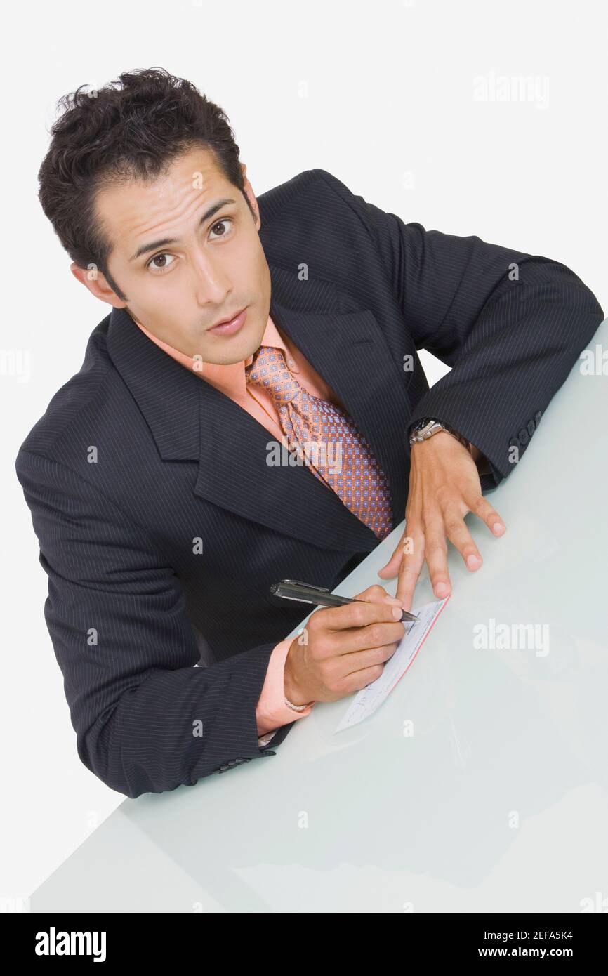 Signing a check hi-res stock photography and images - Alamy