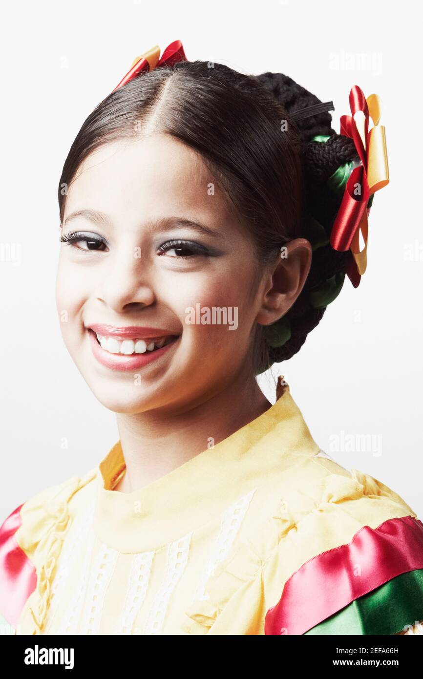 Portrait of a girl wearing traditional clothing and smiling Stock Photo ...