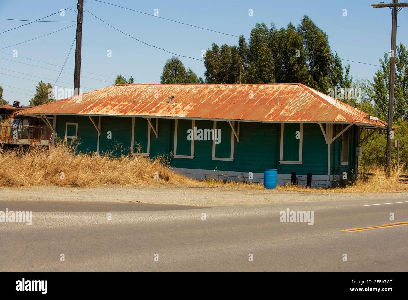 Building at the roadside Stock Photo - Alamy