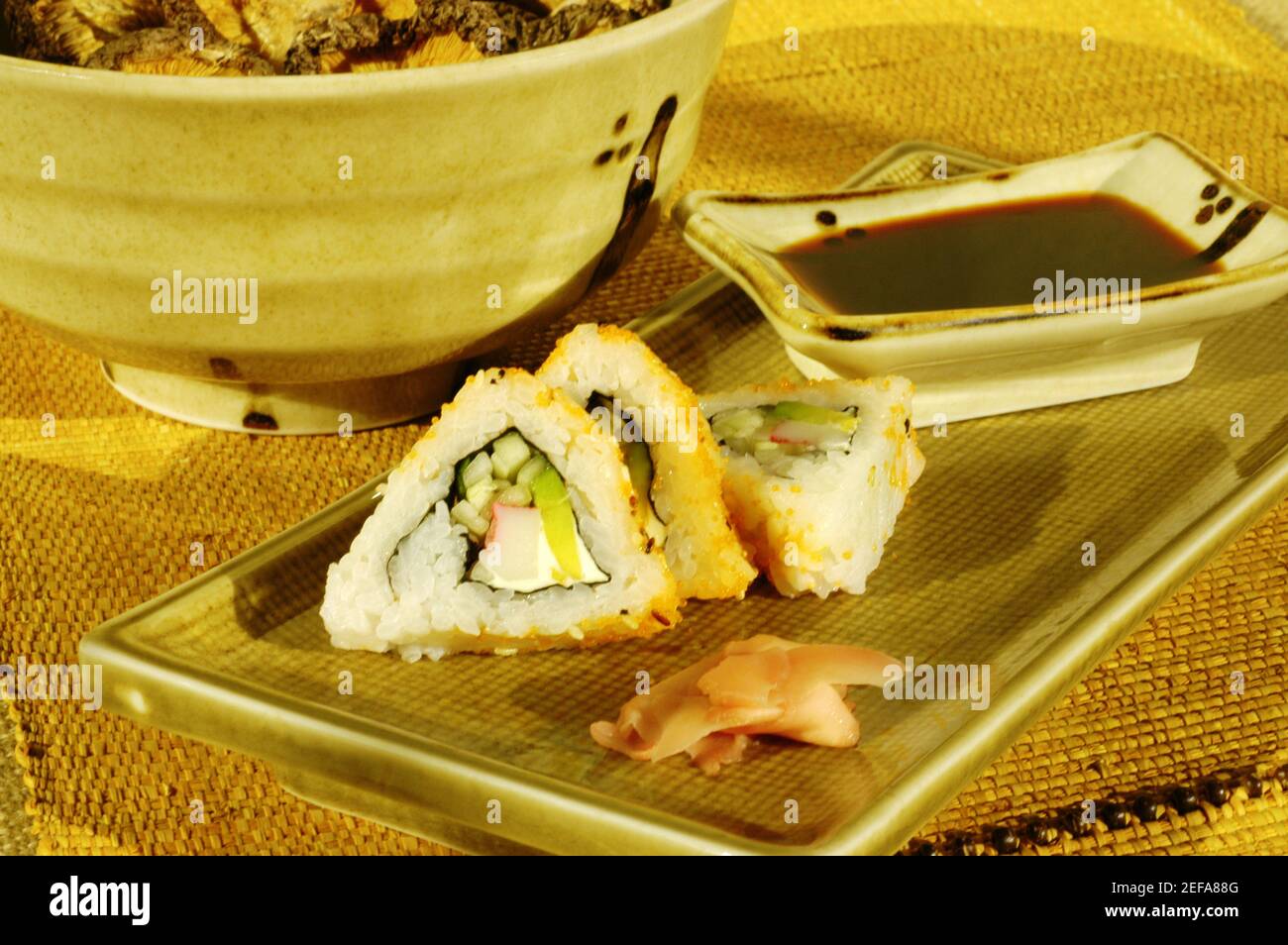 Close-up of sushi with soy sauce on a serving tray Stock Photo - Alamy