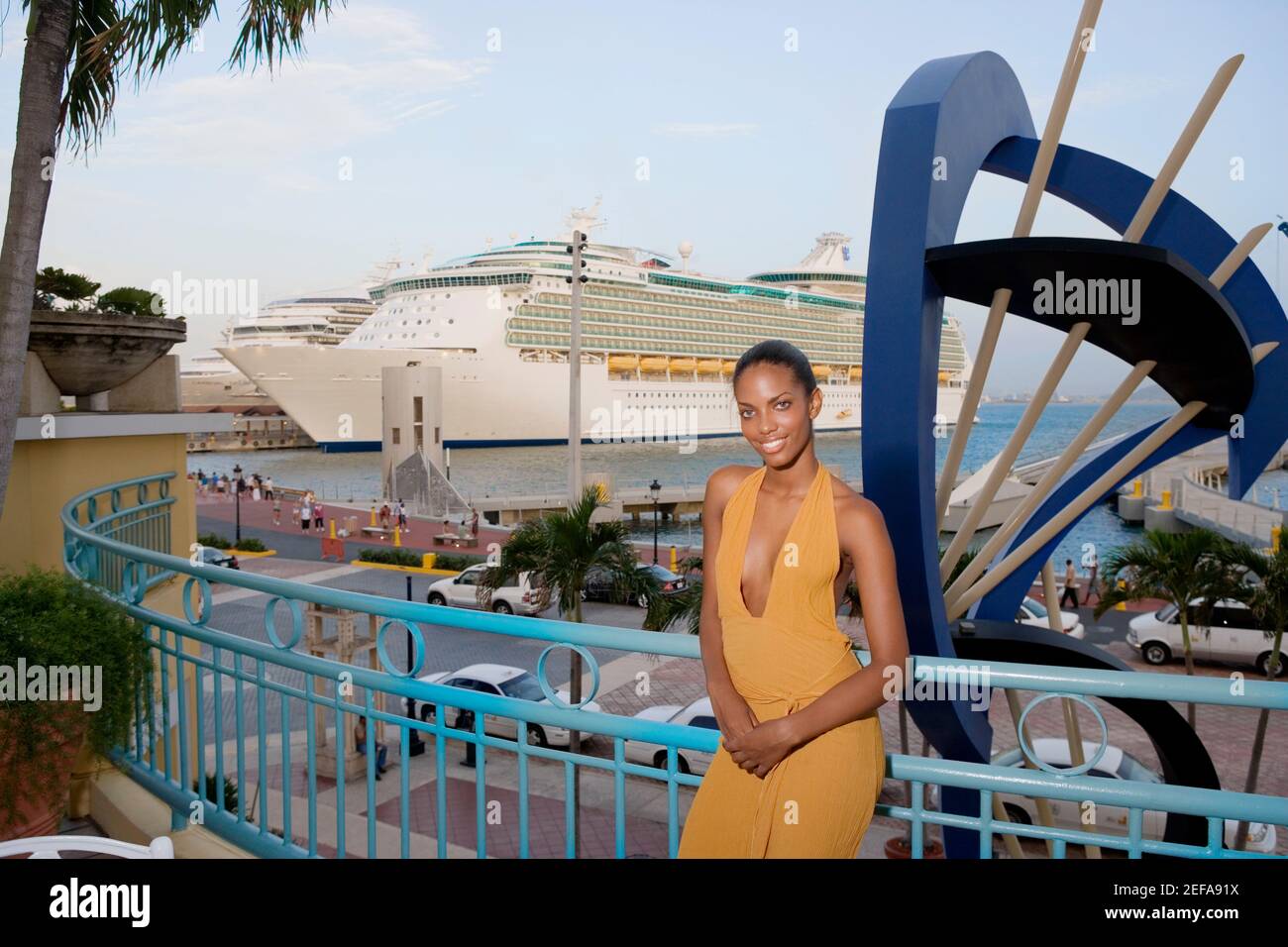 Portrait girl leaning against railing hi-res stock photography and ...