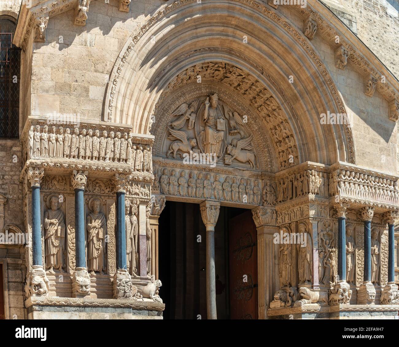 Entrance of the Church of St. Trophime in Arles. Built between the 12th ...