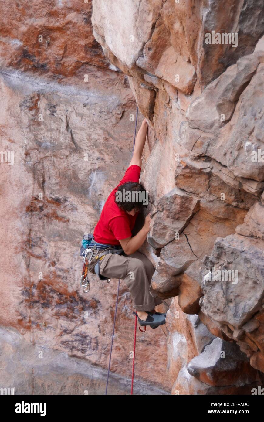 Man rappelling rock face hi-res stock photography and images - Alamy