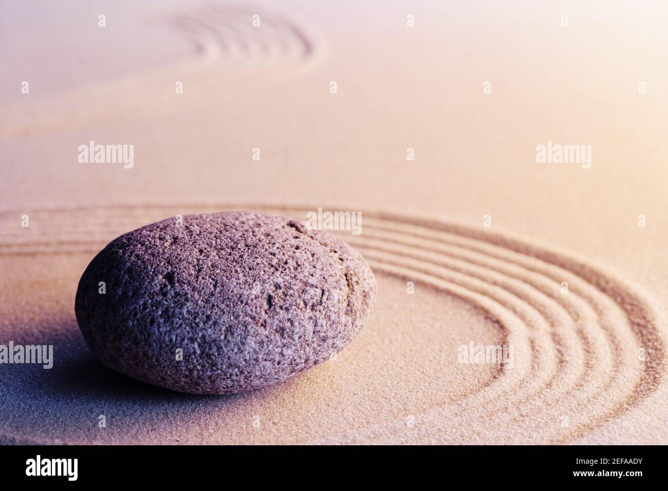 Meditation zen garden with stones on sand Stock Photo - Alamy