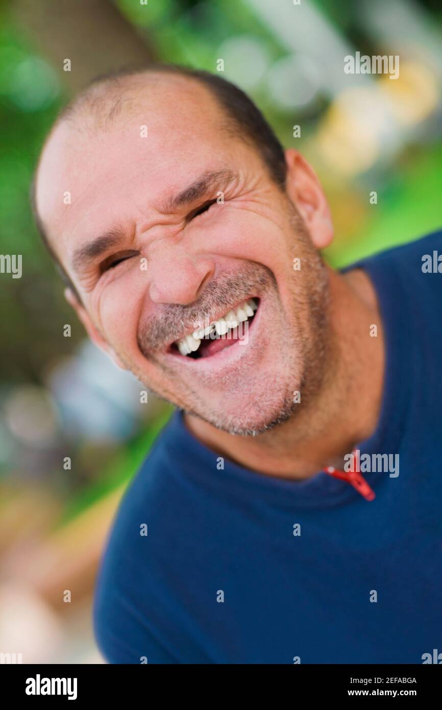 Laughing mid adult man hi-res stock photography and images - Alamy