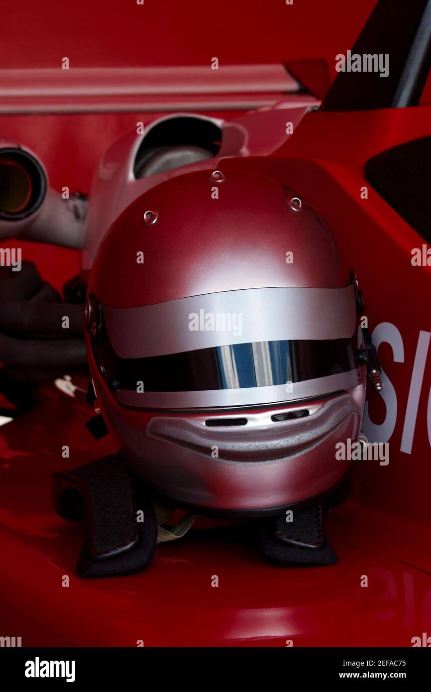 Close-up of a crash helmet on a racecar Stock Photo - Alamy