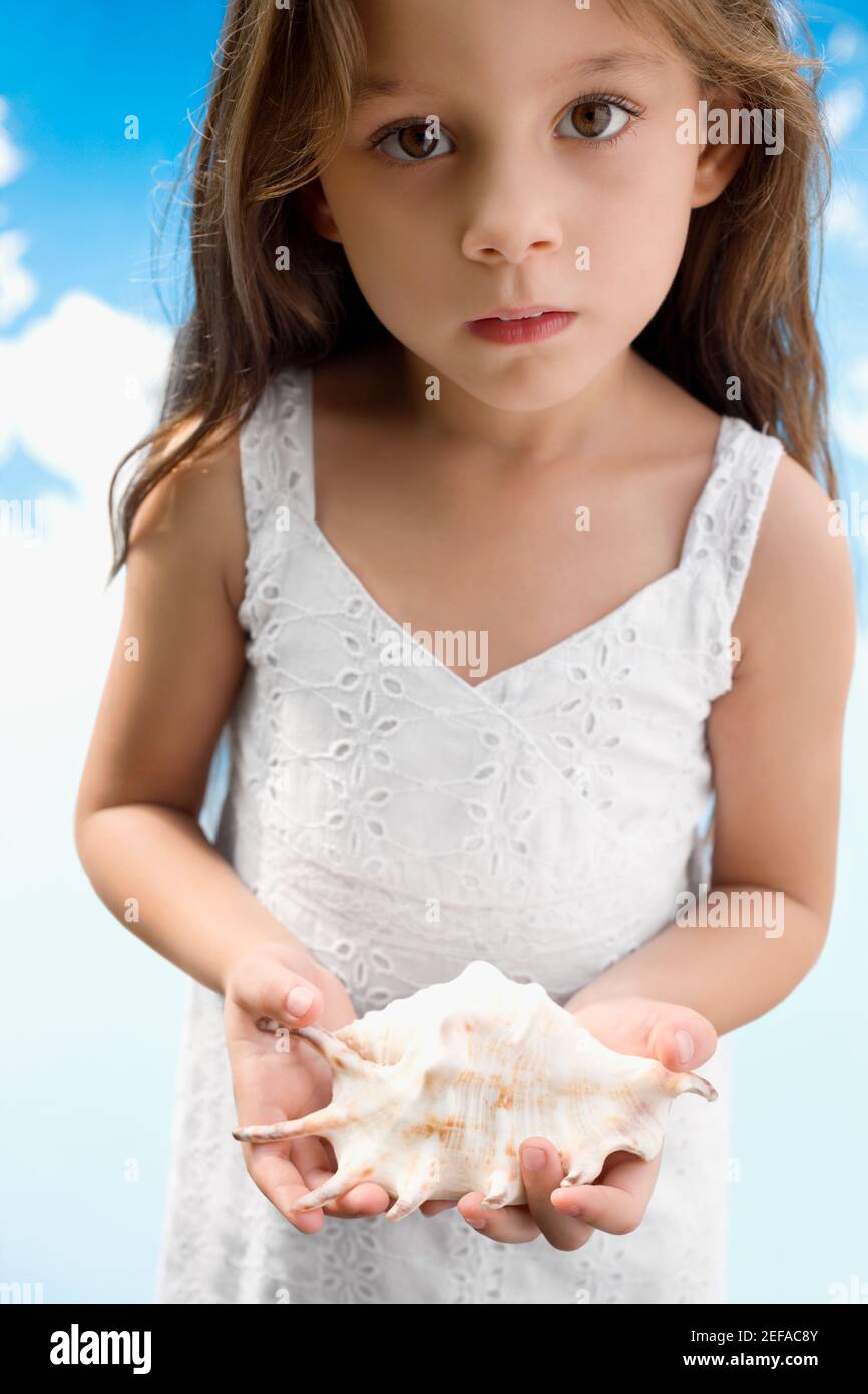 Seashell and child hi-res stock photography and images - Alamy