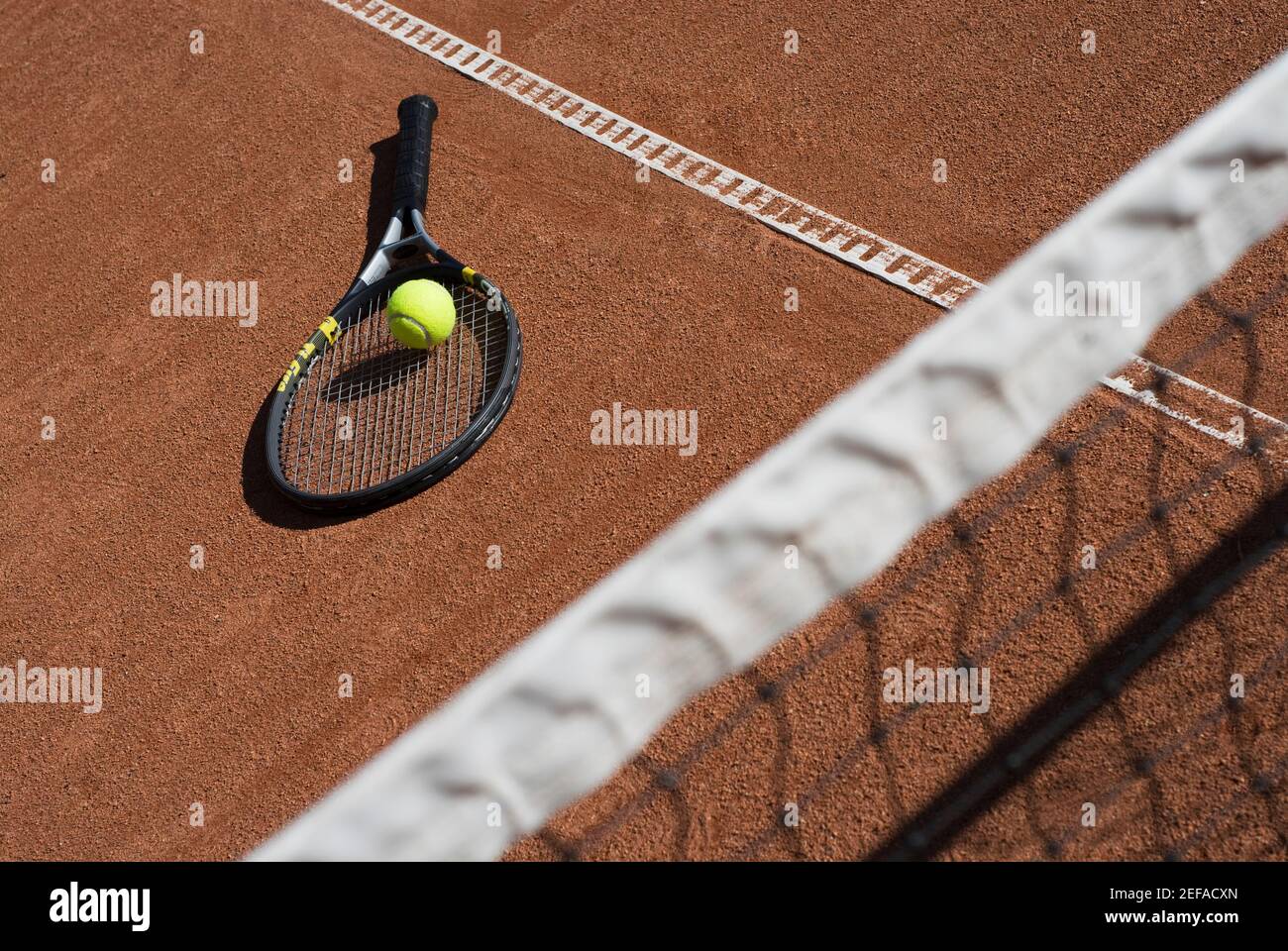 Sunlight on ball and racket hi-res stock photography and images - Alamy