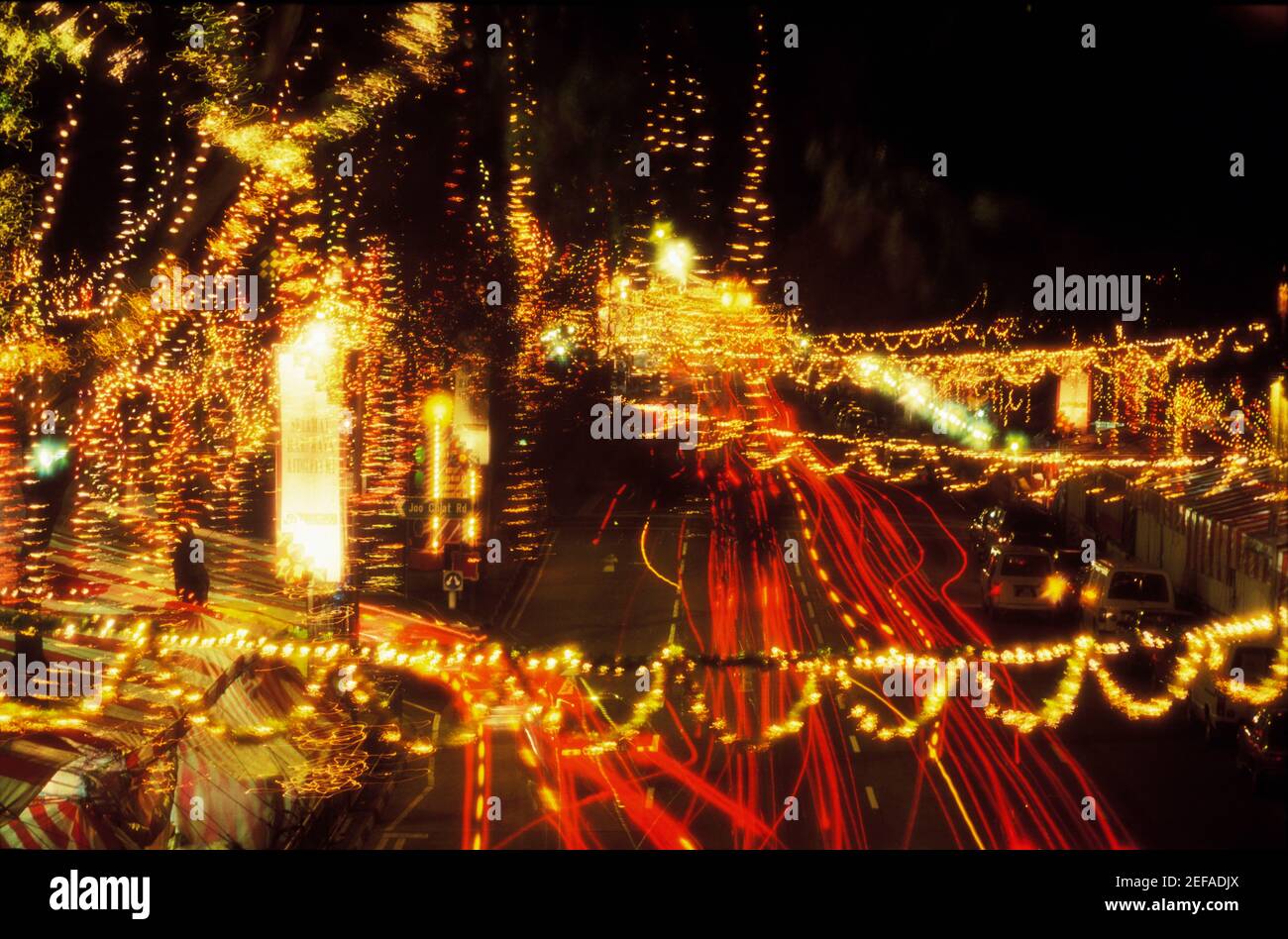 Electric light hanging on a temple, Singapore Stock Photo - Alamy