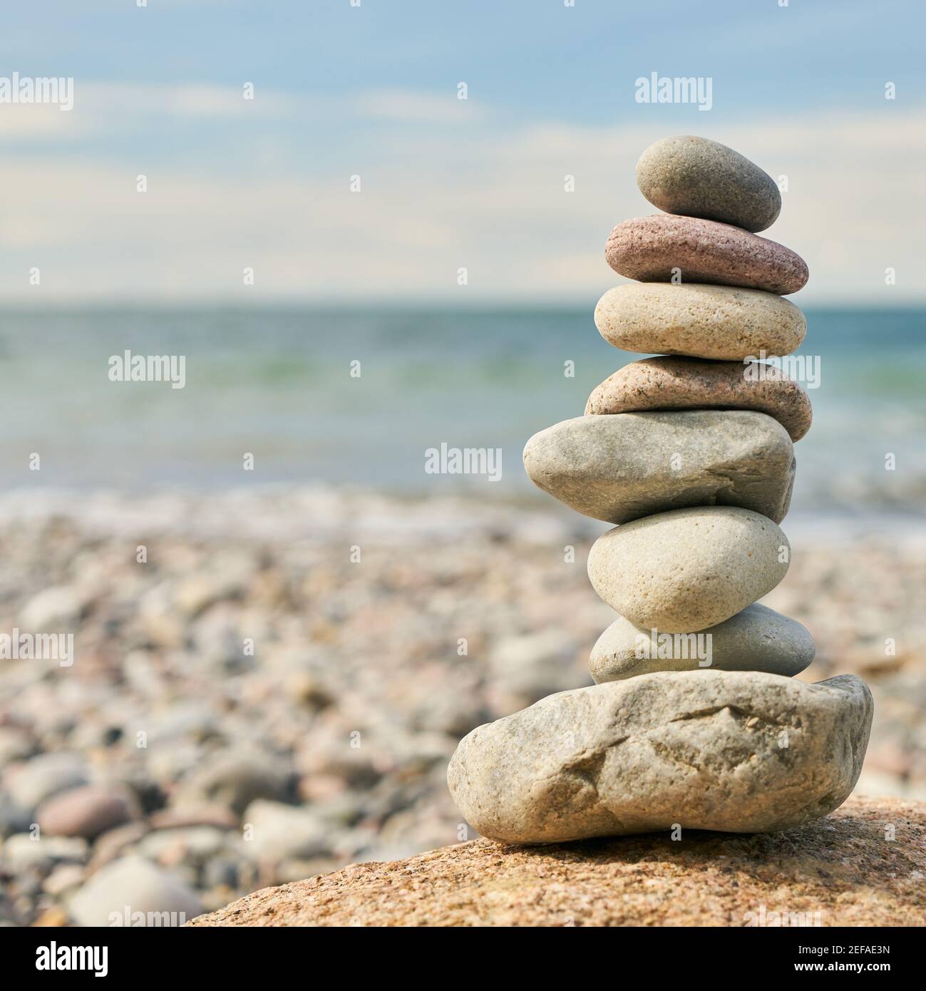Stones as a stack balanced for Zen meditation on the beach Stock Photo ...