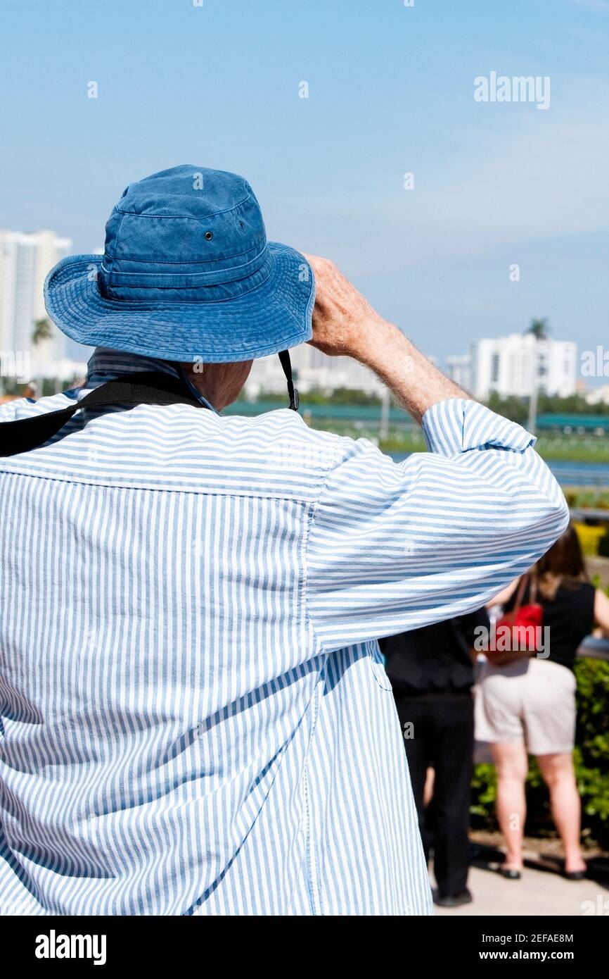 Standing at race track railing hi-res stock photography and images - Alamy