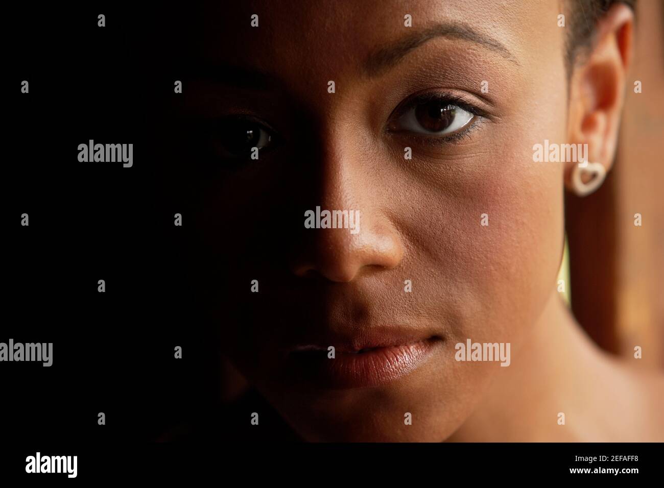 African american woman serious face hi-res stock photography and images ...