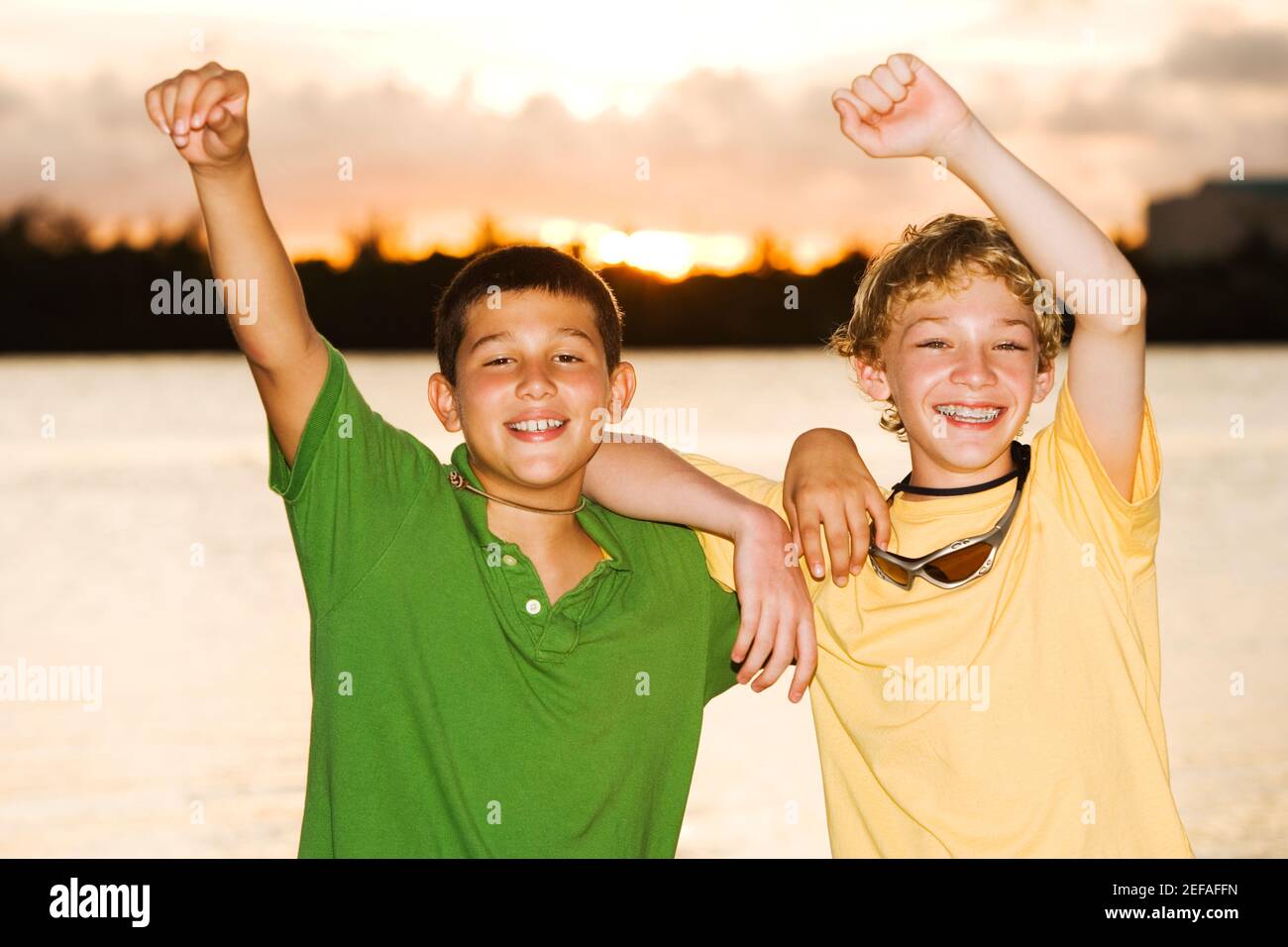 Portrait of two brothers smiling Stock Photo - Alamy