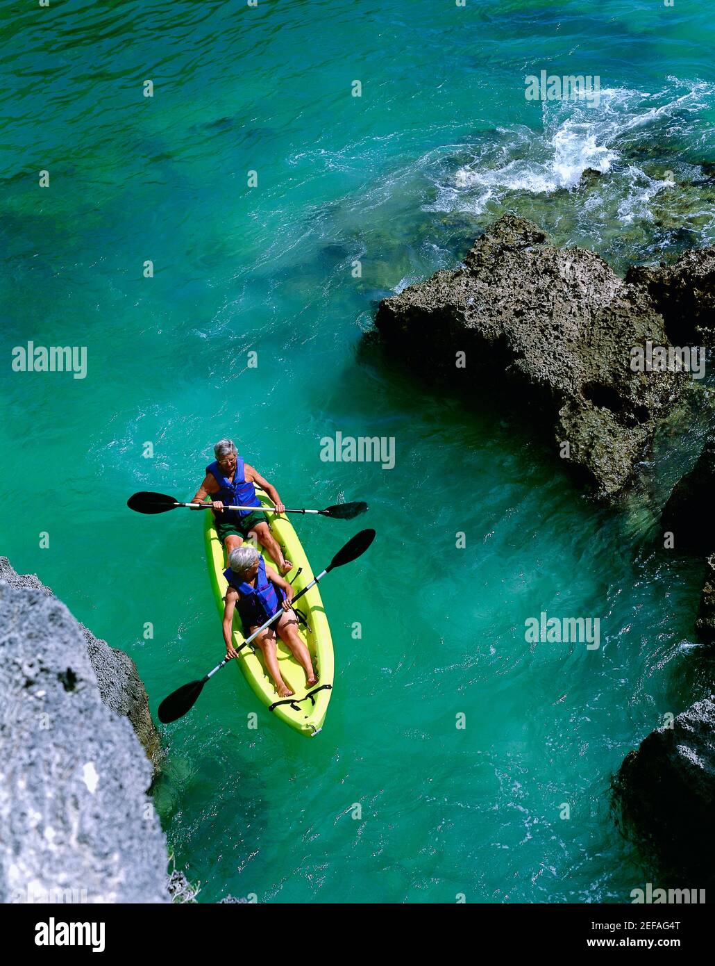 High angle view of two people rafting in the sea, Bermuda Stock Photo ...