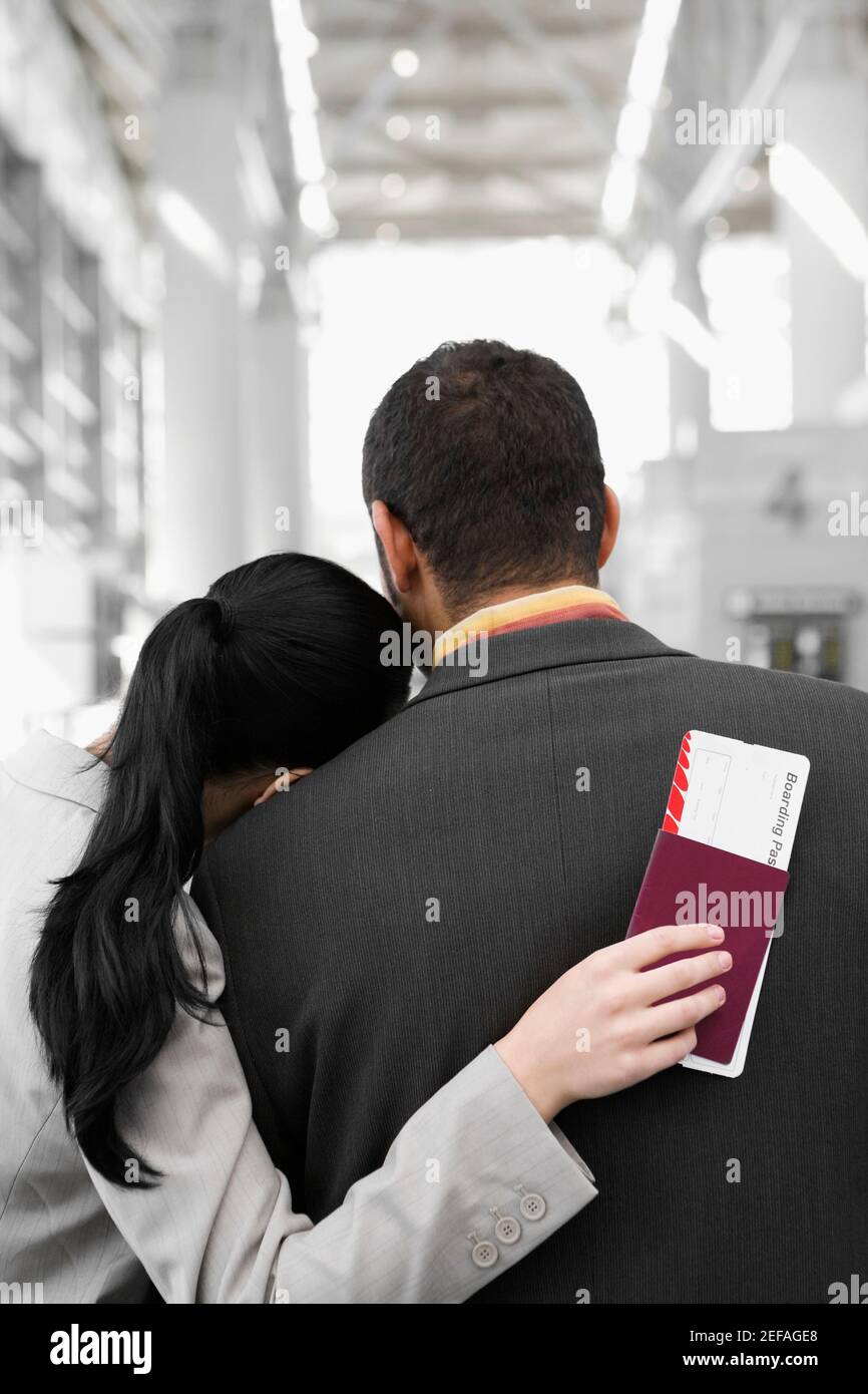 Arm around shoulder rear view hi-res stock photography and images - Alamy