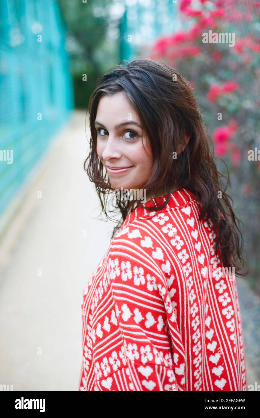 Side profile of a young woman smiling Stock Photo - Alamy