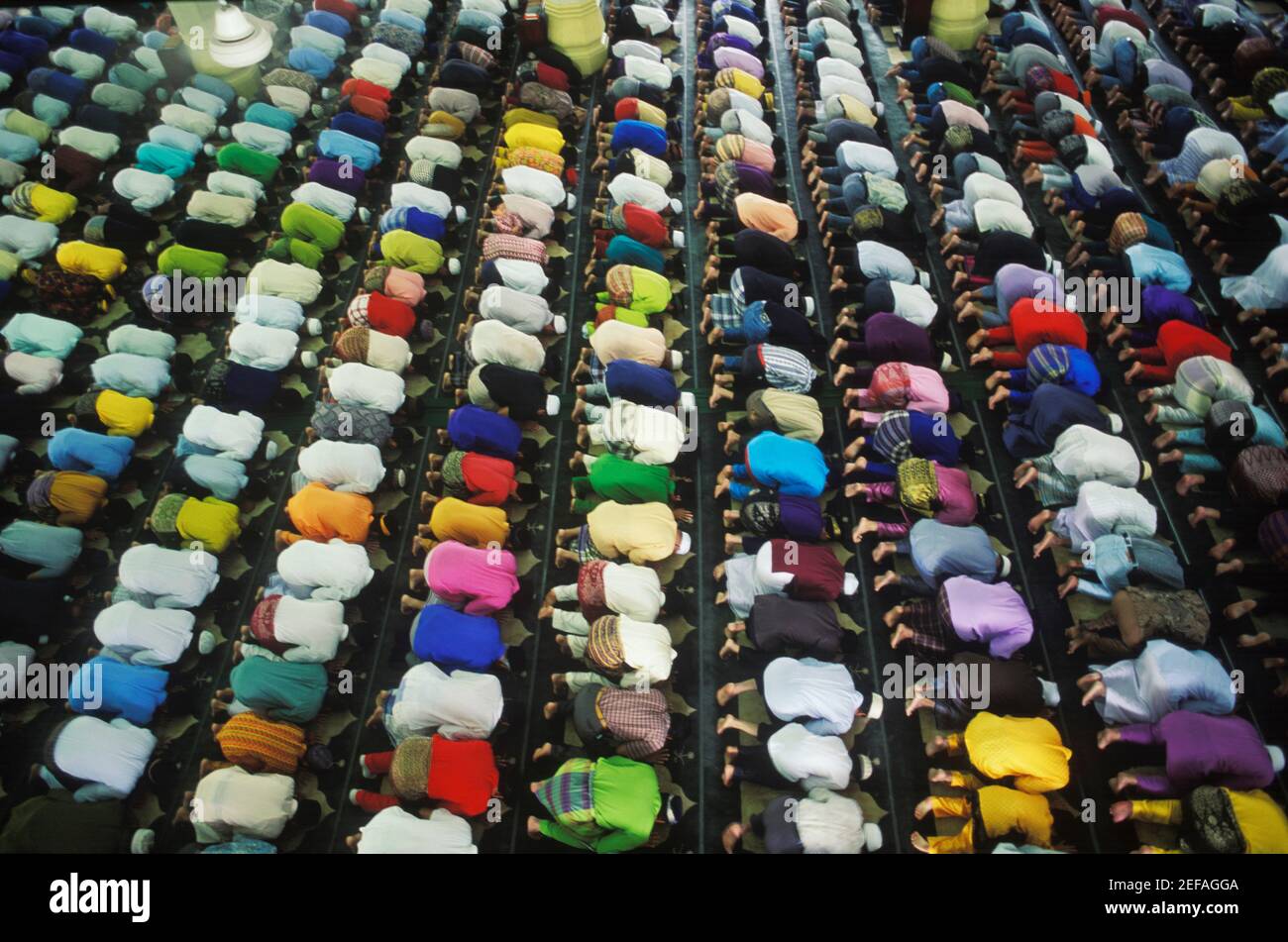 High angle view of a crowd of people praying in a mosque Stock Photo ...