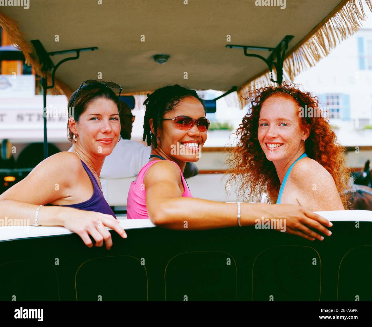 Portrait of three young women smiling, Bermuda Stock Photo - Alamy
