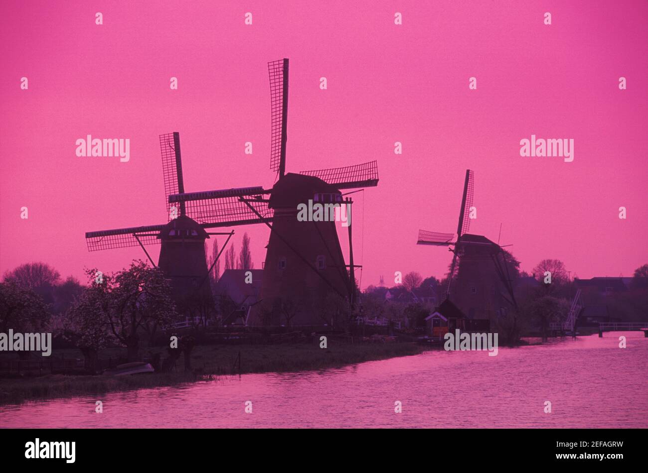 Traditional windmill at the waterfront Stock Photo - Alamy