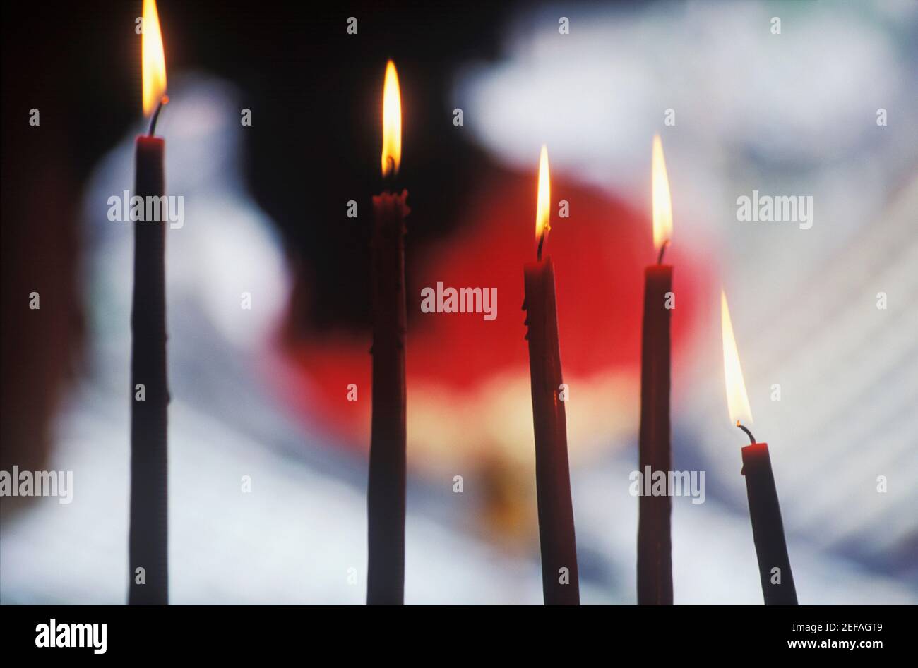 Row of low candle flame hi-res stock photography and images - Alamy
