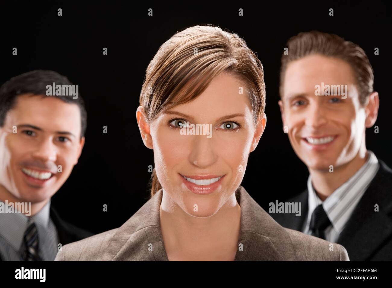 Portrait of business executives smiling Stock Photo - Alamy