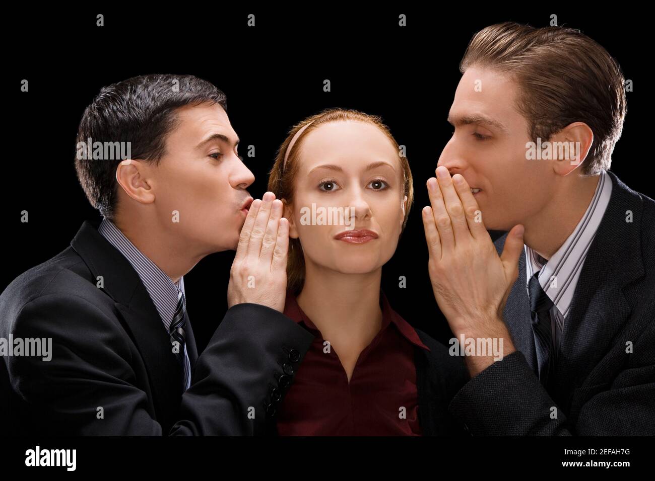 Team whispering hi-res stock photography and images - Alamy