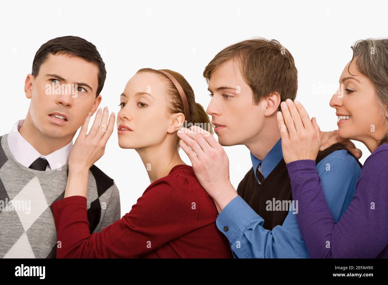 Team whispering hi-res stock photography and images - Alamy