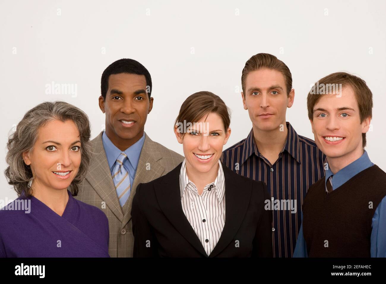 Portrait of five business executives smiling Stock Photo - Alamy